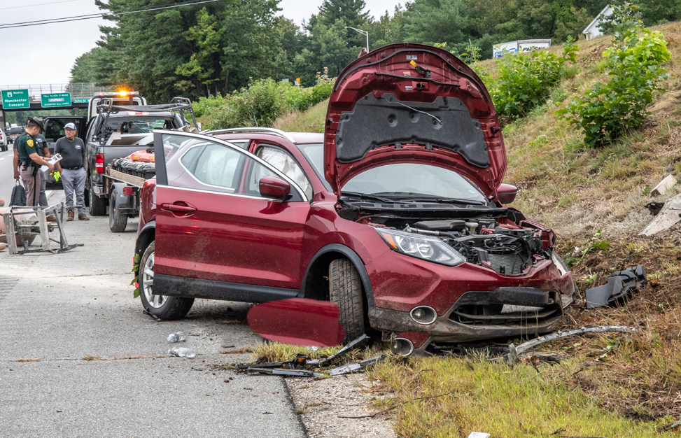 Section of Everett Turnpike guard rail impales vehicle, trapping driver ...